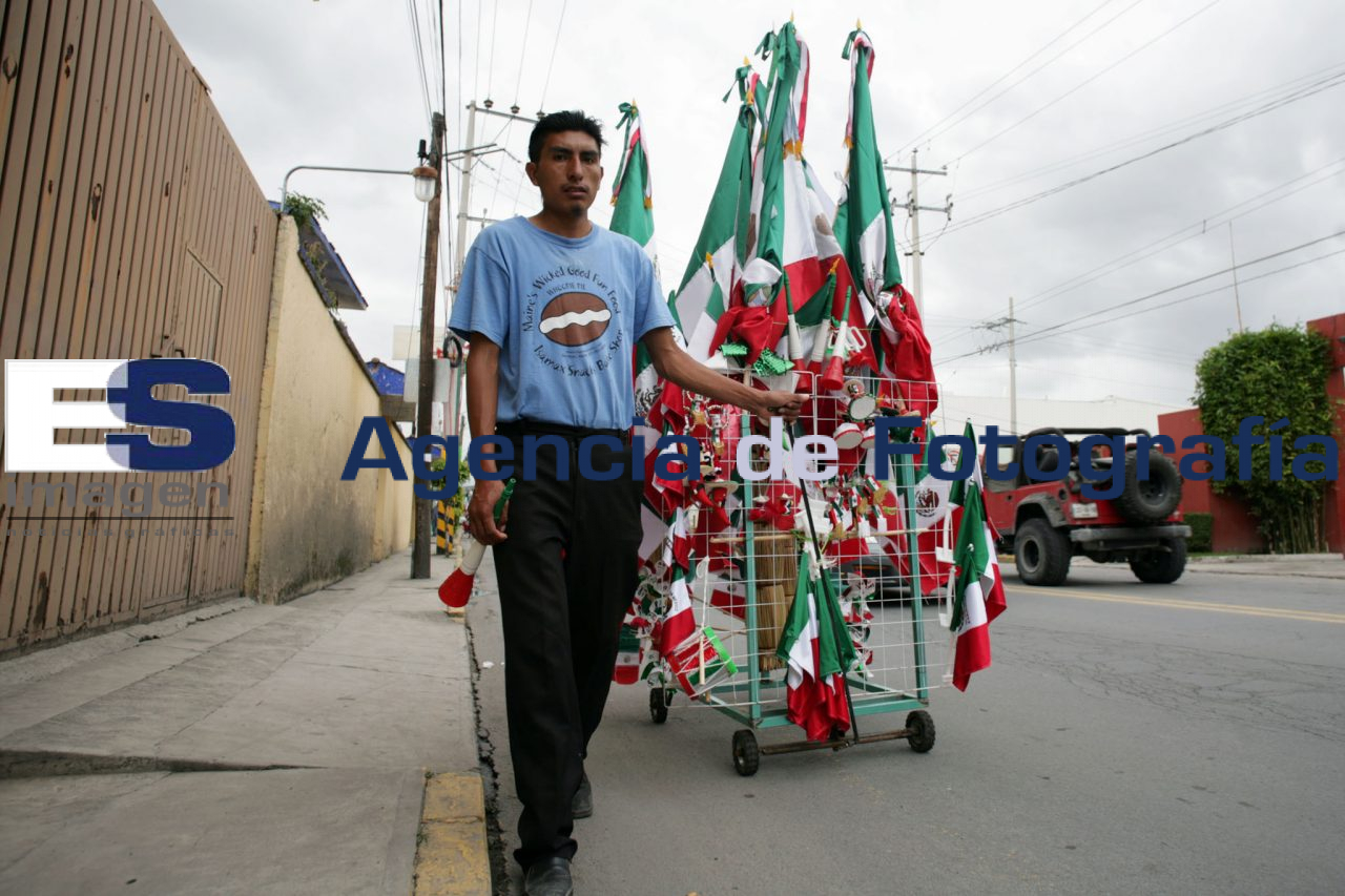 Vendedores de banderas - Agencia de Fotografía Es Imagen